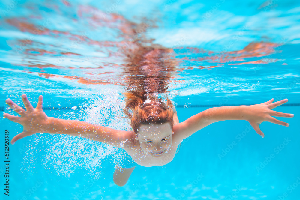 Child in pool in summer day. Young boy swim and dive underwater. Under ...