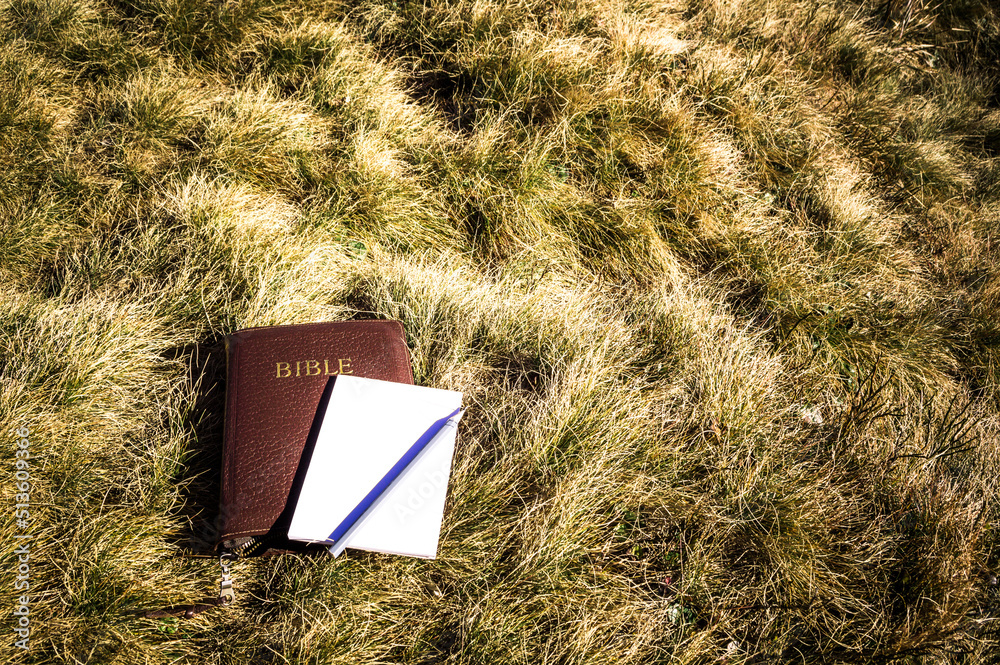 Outdoor Bible study during mountain hike in the fall. Bible, empty ...