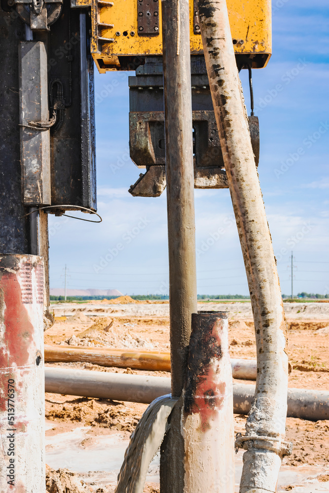 Hydraulic drilling machine at the construction site. Pile field. Modern ...