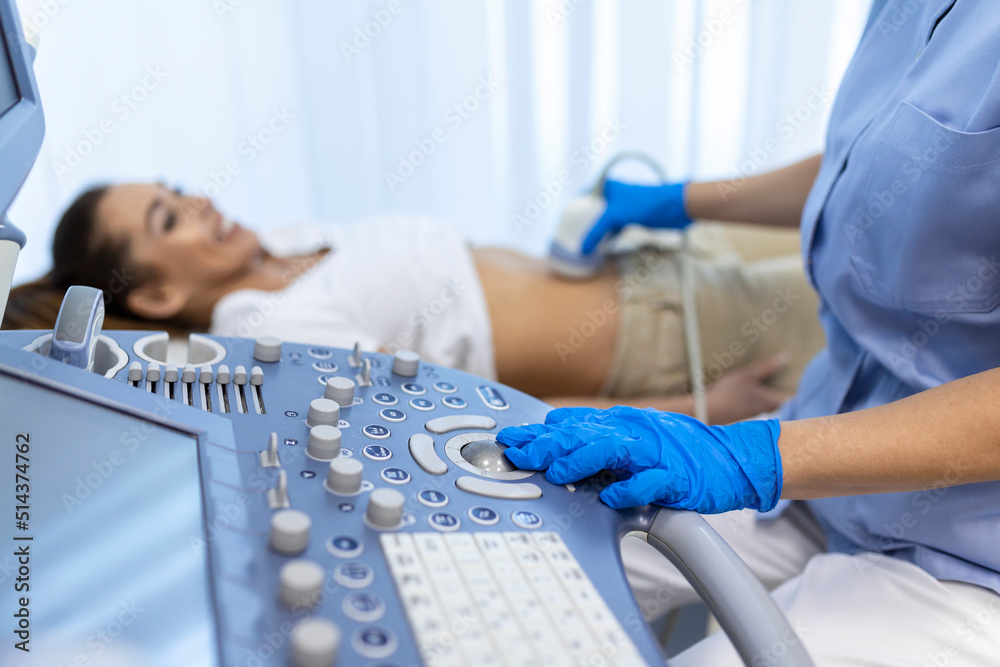 Ultrasound diagnostic of stomach on abdominal to woman in clinic ...
