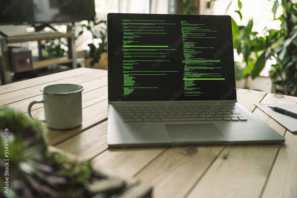 Computer coding language on laptop screen at home office Stock Photo ...