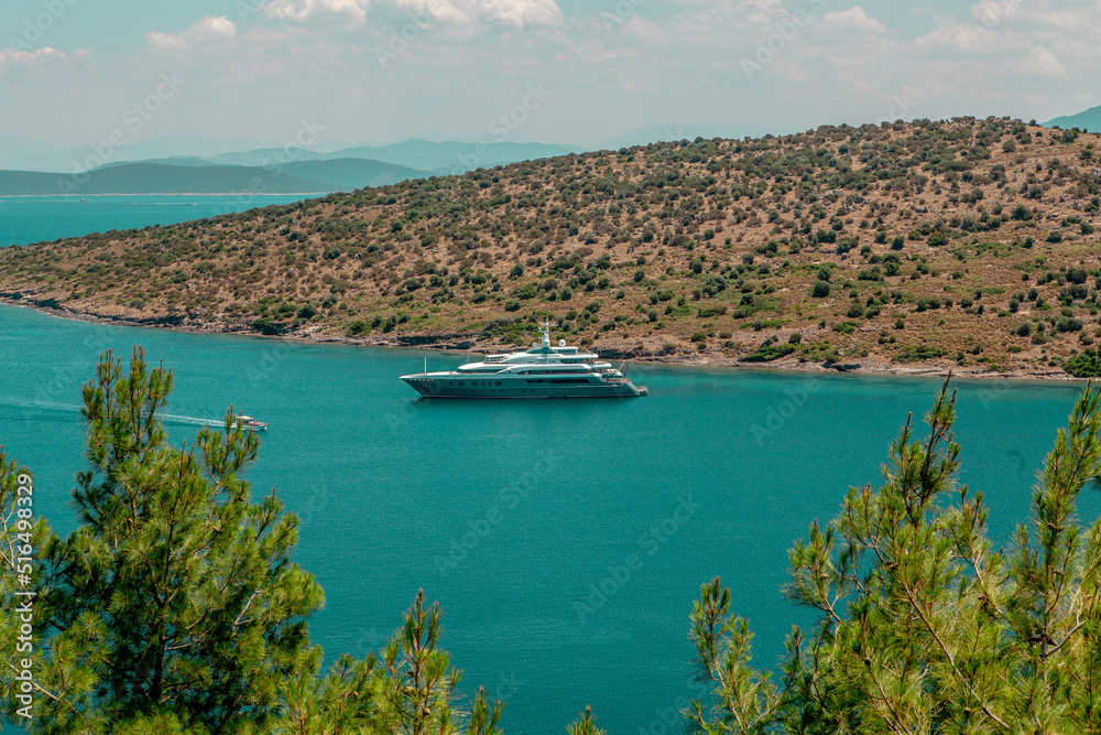 Luxury yacht above the sea.Green forest and clear sky.Beautiful view ...