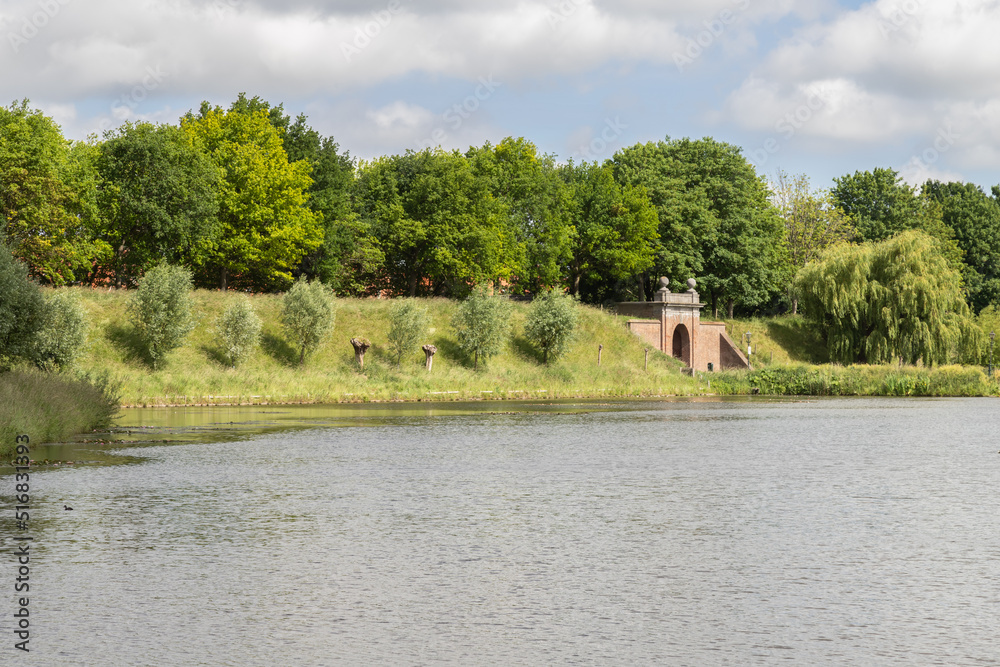 18th-century city gate and ramparts at the medieval Dutch fortified ...