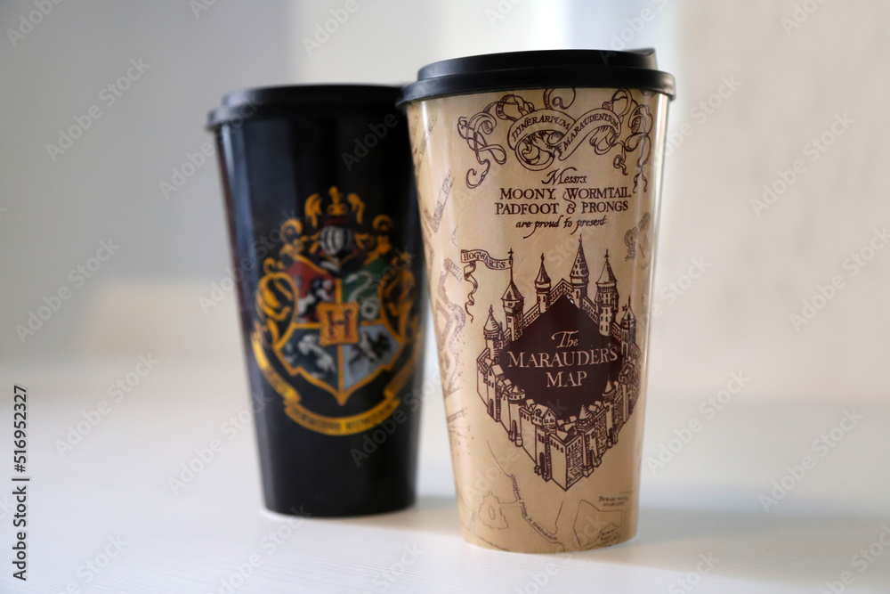 Stock-Foto „Harry Potter tall plastic cup. Hogwarts House Crest and ...