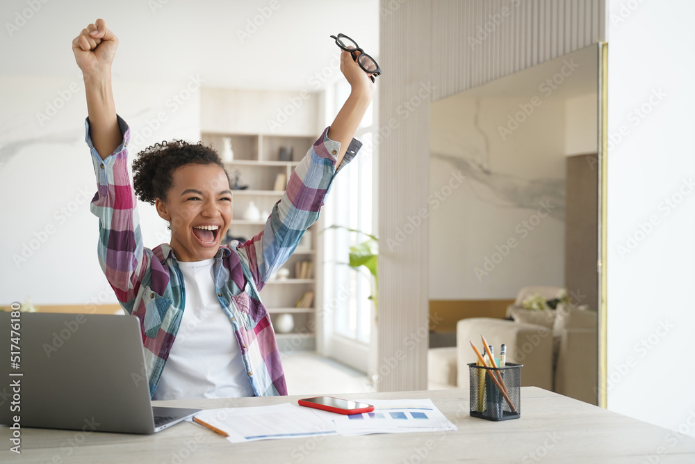 Overjoyed african american student teen girl got email with good exam ...