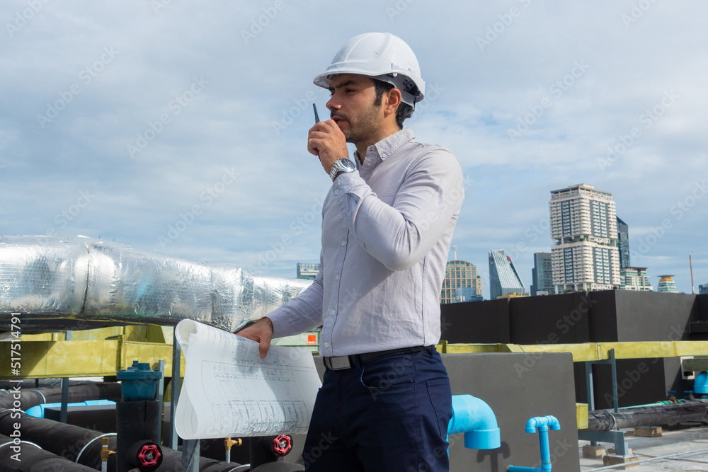 Engineer under checking the industry chilled water fan coil unit air ...