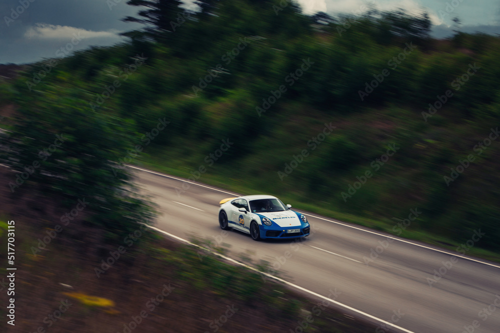 Porsche 911 Turbo S going fast at the autobahn Stock Photo | Adobe Stock