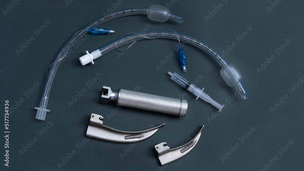 tracheal intubation kit: laryngoscope, several laryngoscope blades and ...