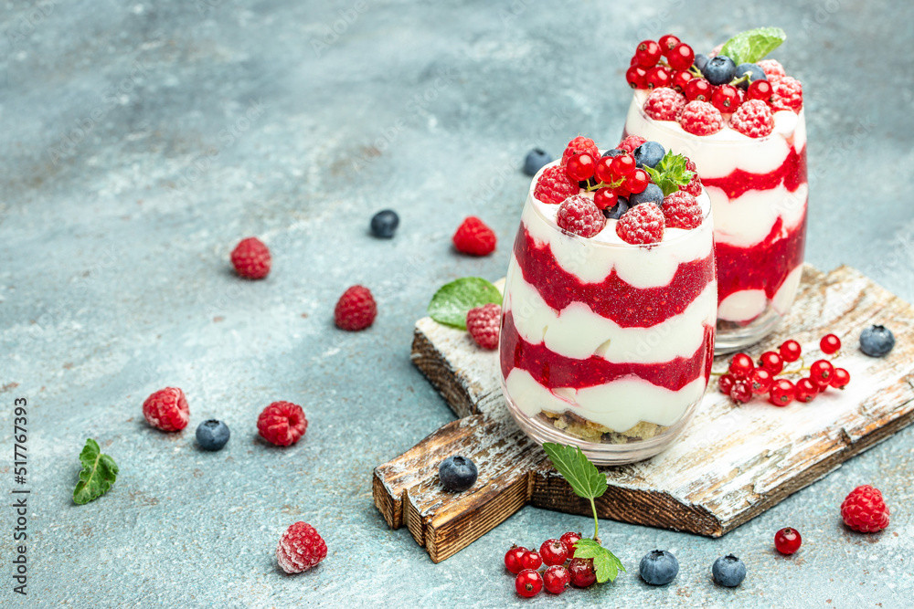 Scottish dessert whipped cream, roasted oatmeal and raspberries in jar ...