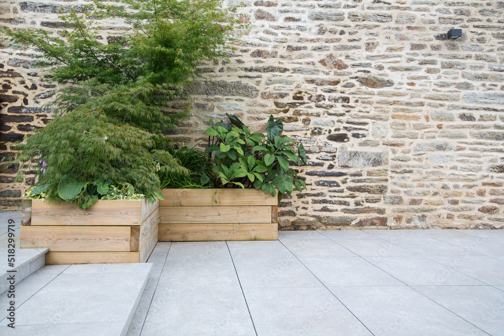 Modern garden design and terrace construction: Hillside plot paved with ...