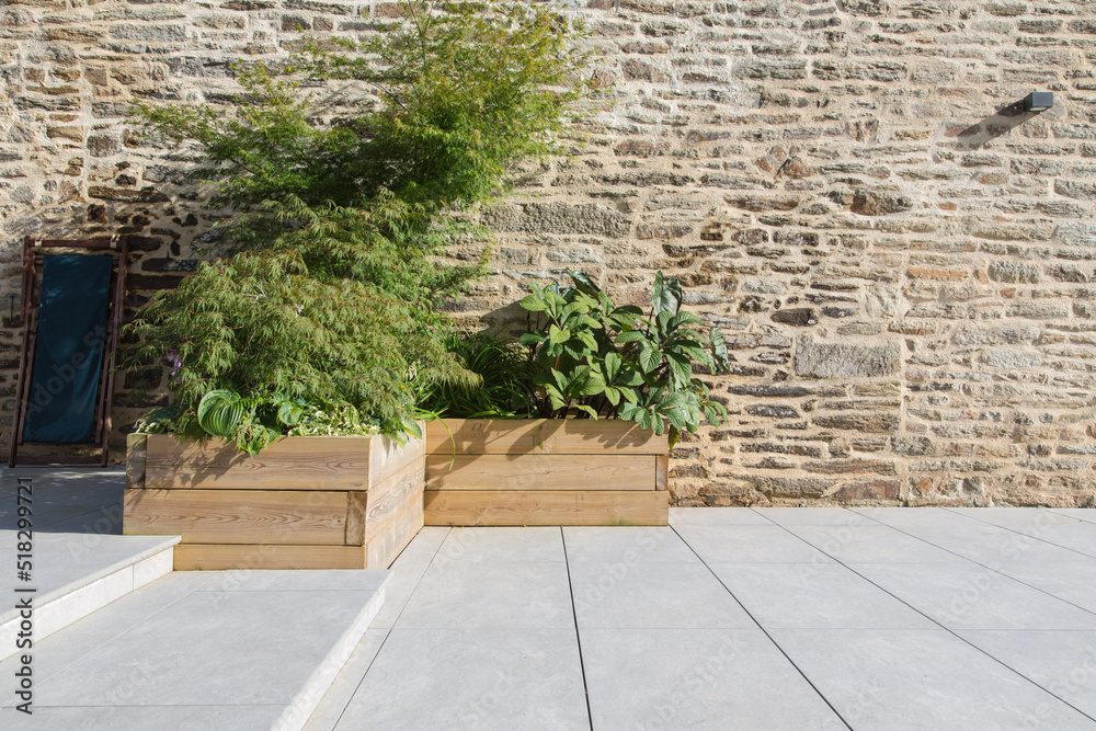 Modern garden design and terrace construction: Hillside plot paved with ...