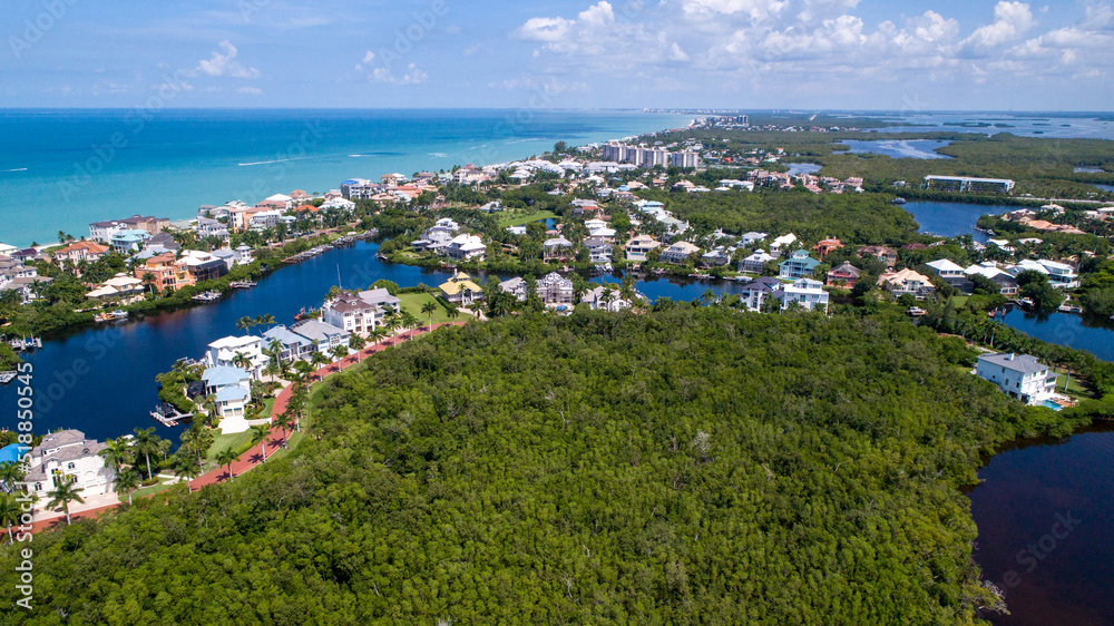 Aerial Drone View of Beachside Community in Naples, Florida with the ...