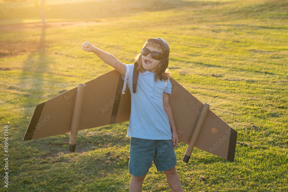 Kid superhero with jetpack. Child pilot play on summer day. Success ...