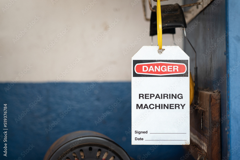 Safety tagout label which is use to attach on the repairing machine or ...