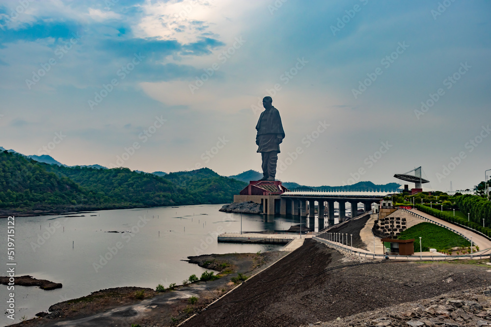 statue of unity the world tallest statue with bright dramatic sky at day from different angle ...