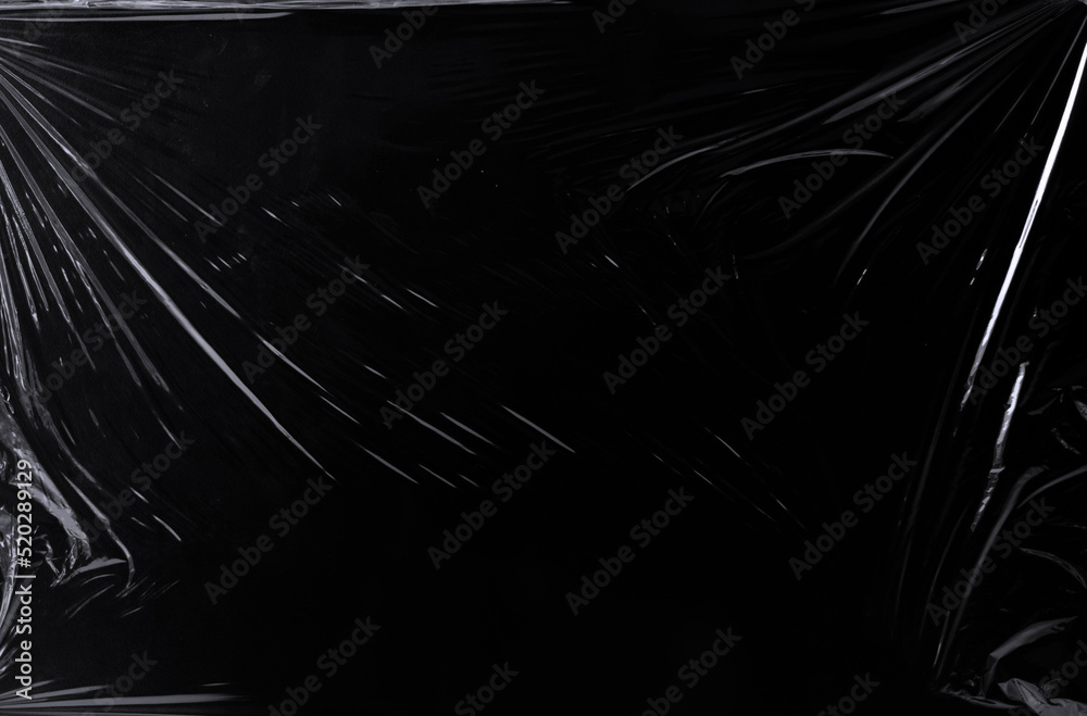 Black transparent plastic wrap texture overlay background. Realistic ...