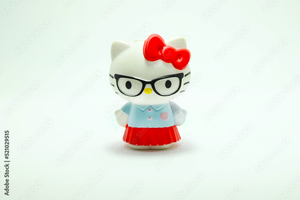 Foto de Stock Hello Kitty with black glasses. Doll. Plastic figure ...