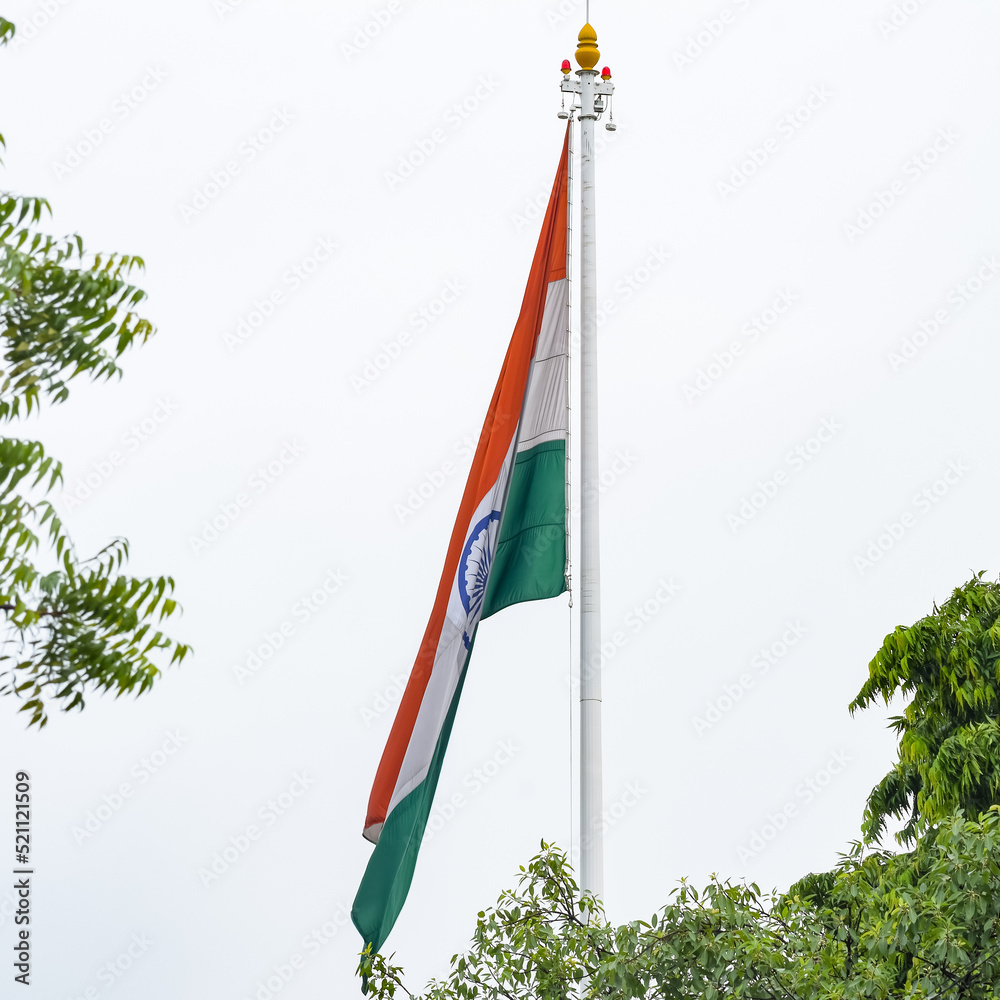 India flag flying high at Connaught Place with pride in blue sky, India ...