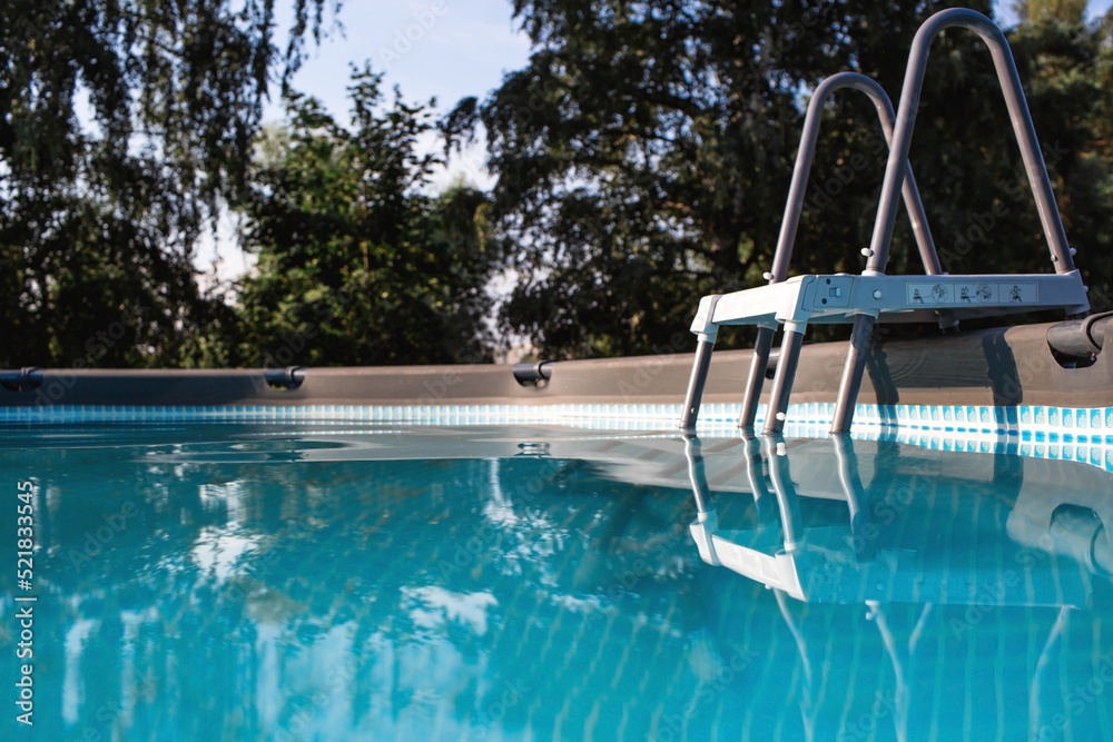 Стоковое фото «Swimming pool with metal frame for home and garden ...