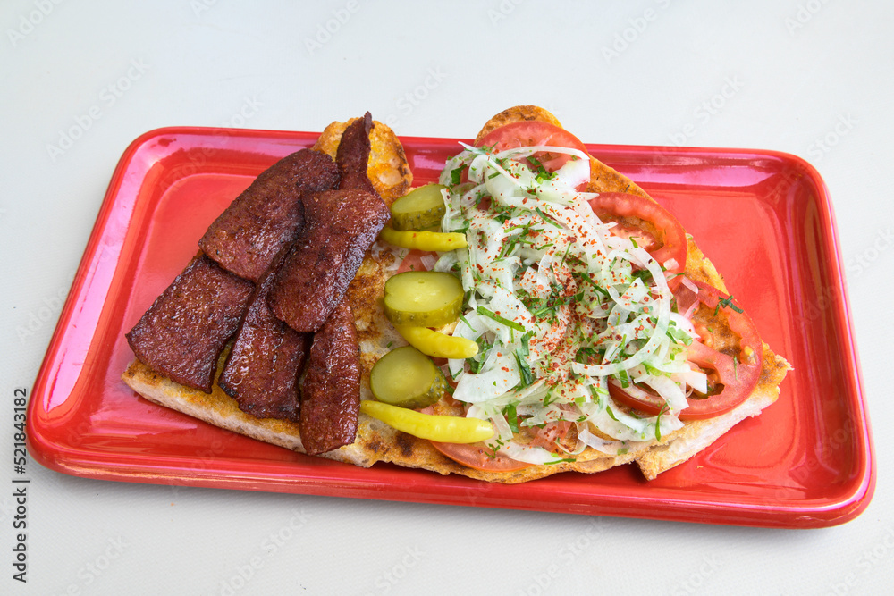 Close-up shot of Izmir's famous Turkish Traditional Kumru Sandwich ...