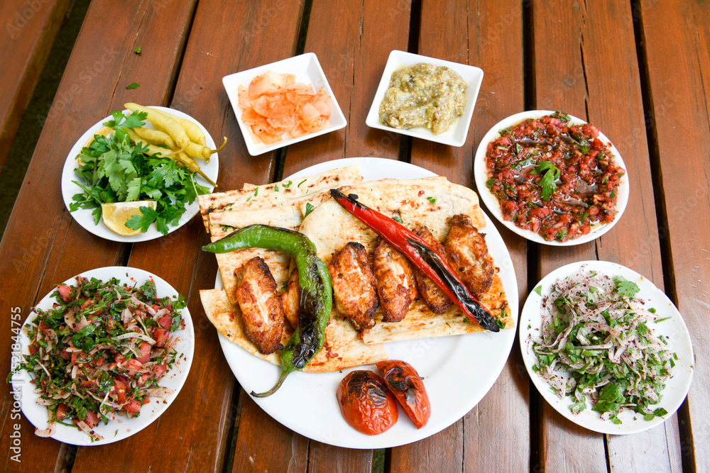 Chicken wings barbeque in a dish with BBQ grill sauce . Izgara tavuk ...