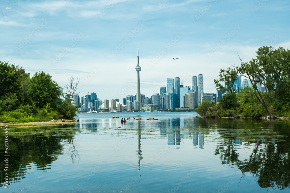 Boaters in canoes and kayaks seen from the Toronto Islands with the ...