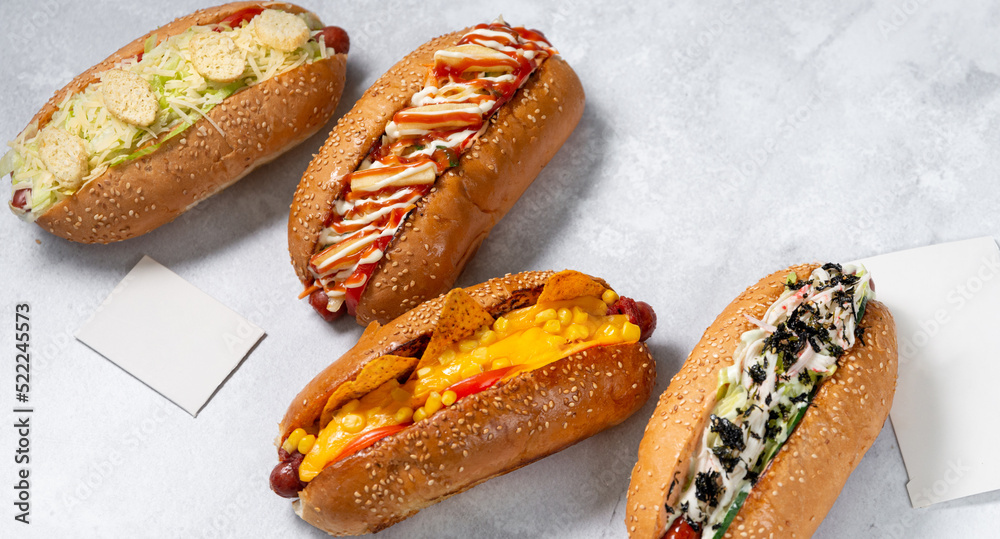 Fast food hot dog banner on a light grey stone textured background ...