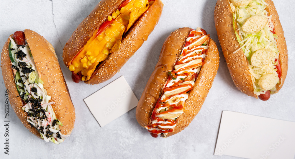 Fast food hot dog banner on a light grey stone textured background ...