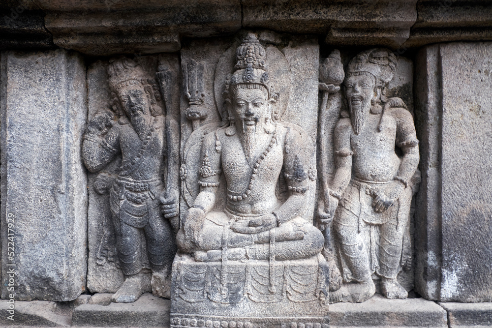 Carving Relief In Prambanan Temple. The temple is adorned with panels ...