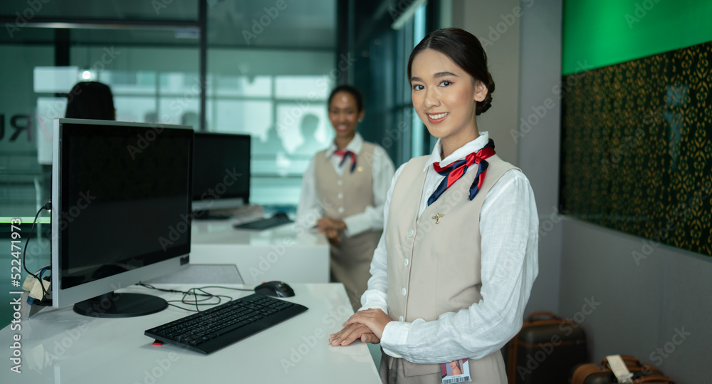 Portrait of beautiful Asian woman airport ground attendant in uniform ...