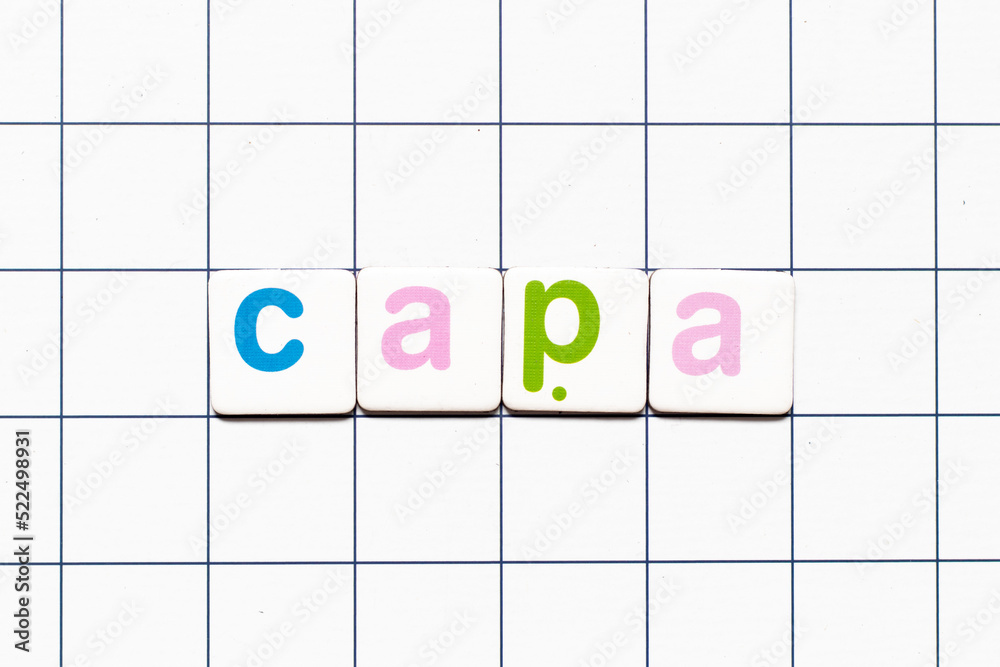 Colorful tile letter in word CAPA (abbreviation of corrective action ...