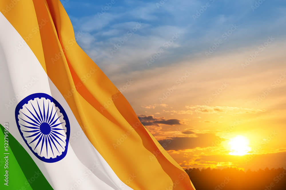 Waving India flag on sunset sky. Background with place for your text ...