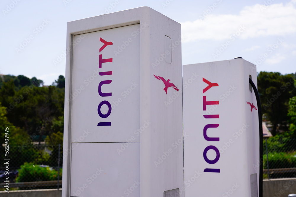 ionity electric car fast charging station logo brand and text sign ...