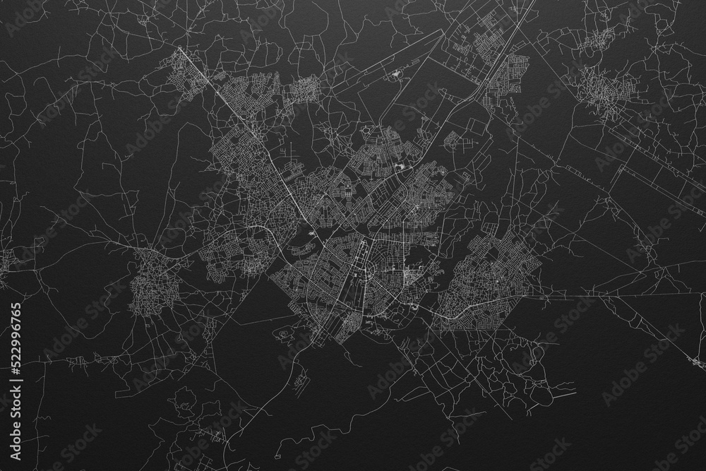 Street map of Gaborone (Botswana) on black paper with light coming from ...