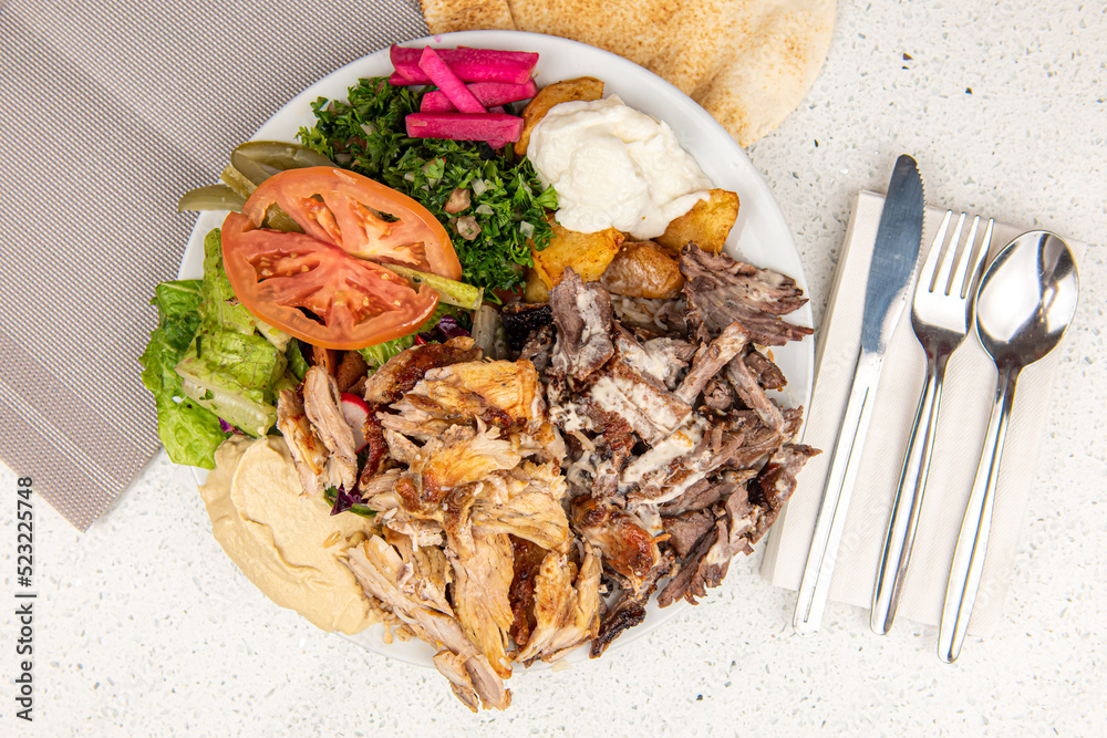 Meat and chicken mix Shawarma Doner on a plate, Meat and chicken mix ...