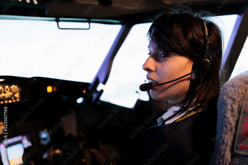 Aircrew copilot using power radar on dashboard to fly aircraft jet ...