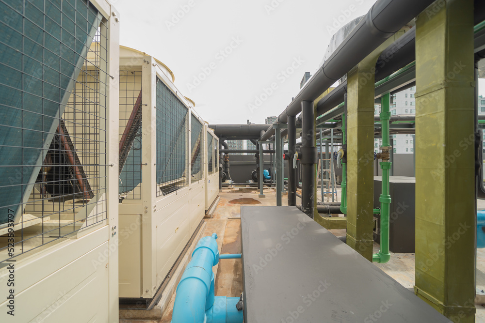 Chiller tower or cooling tower on rooftop of a office building in urban ...