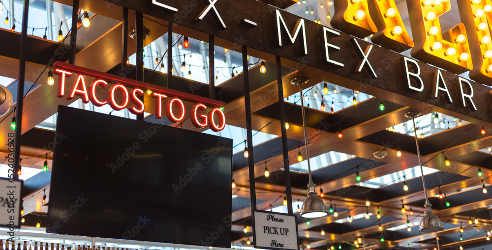 Modern Bar and Tex Mex restaurant welcome sign with LED Tacos to go ...