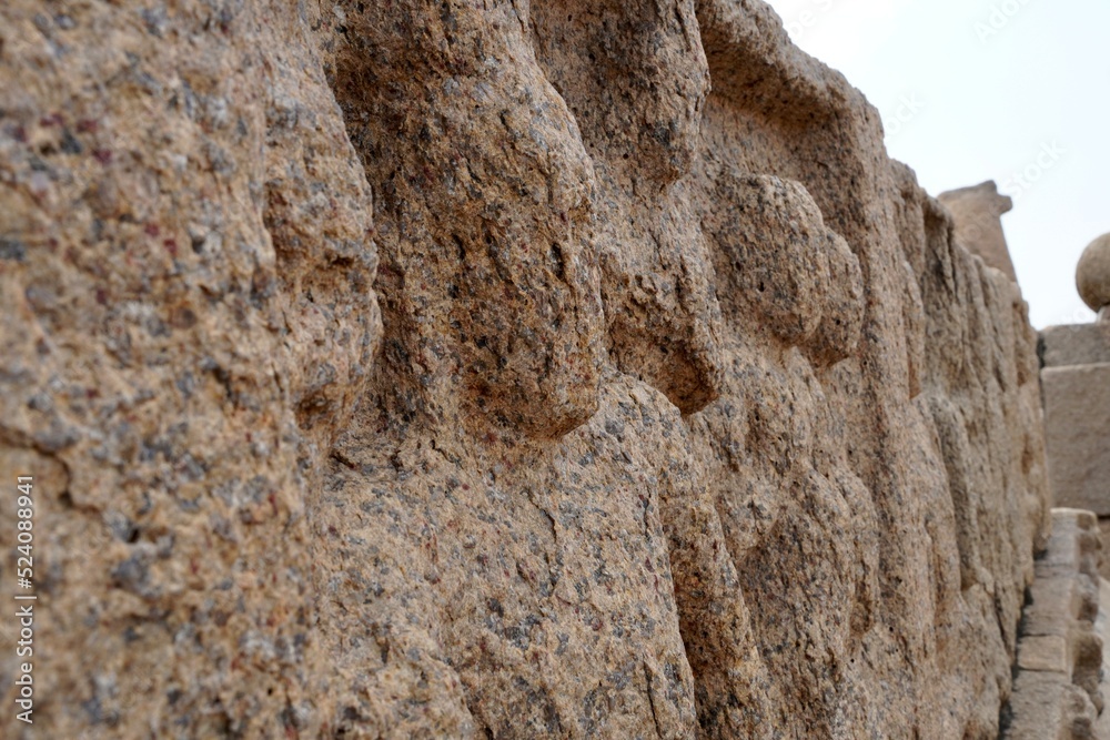 Bas relief rock cut sculptures of gods, people and animals are carved ...