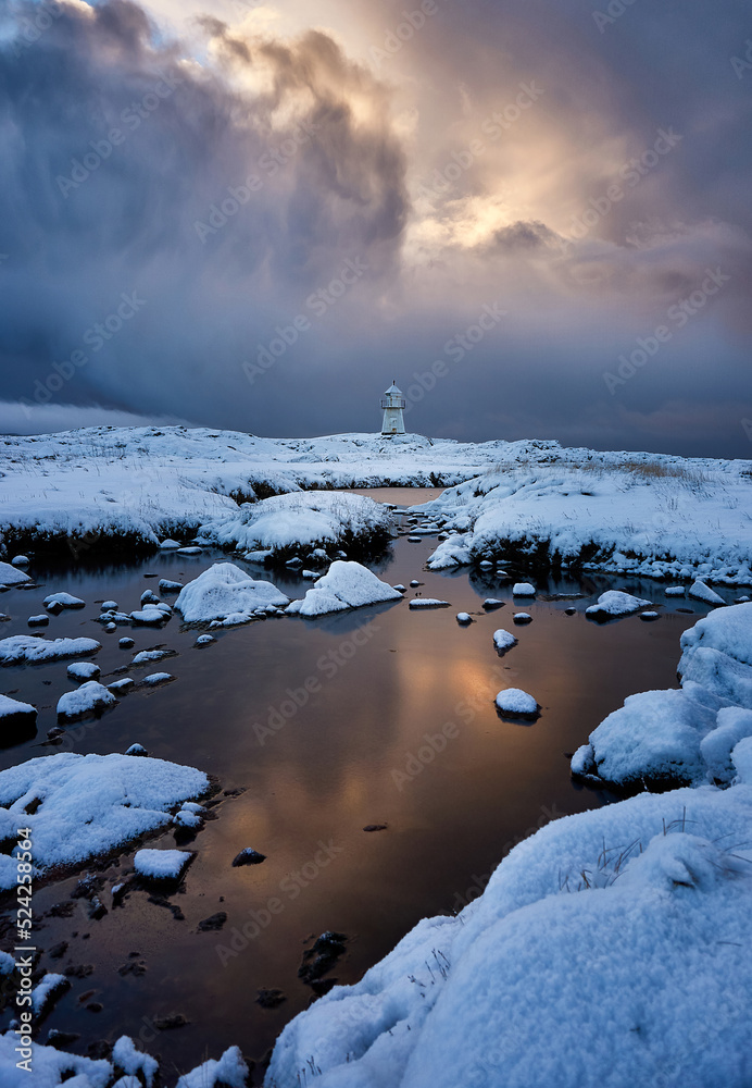 One of the lighthouses on Vigra during a winter sunset, Giske, Ålesund ...