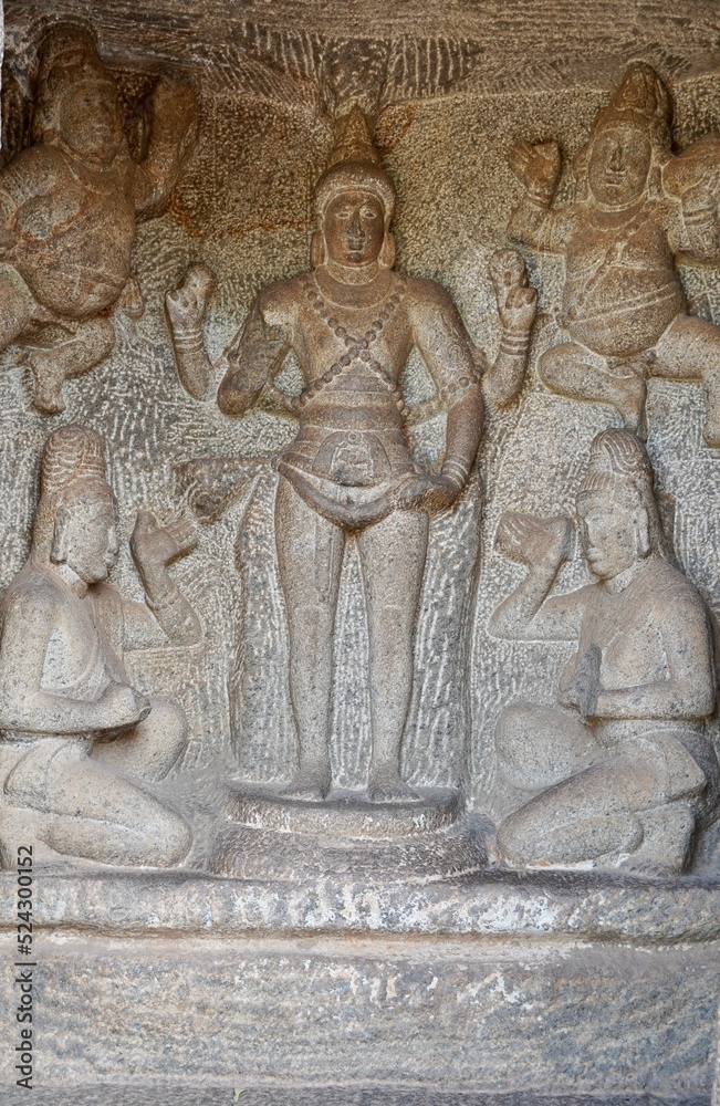 Bas relief rock cut sculptures of gods, people and animals are carved prominently in the ...