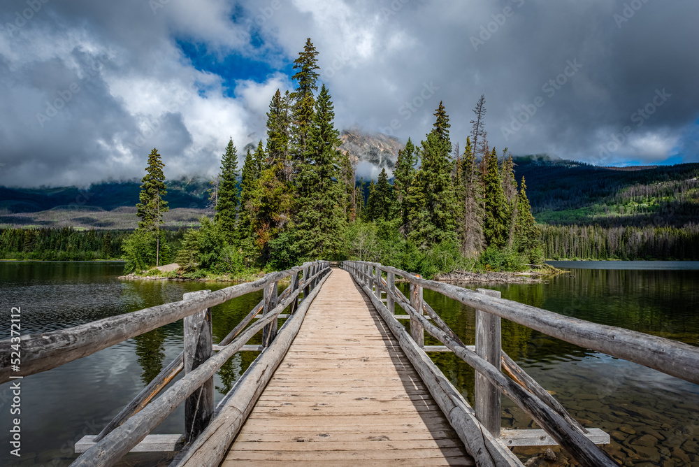 Blue sky appearing through low clouds over the Pyramid Lake Island ...