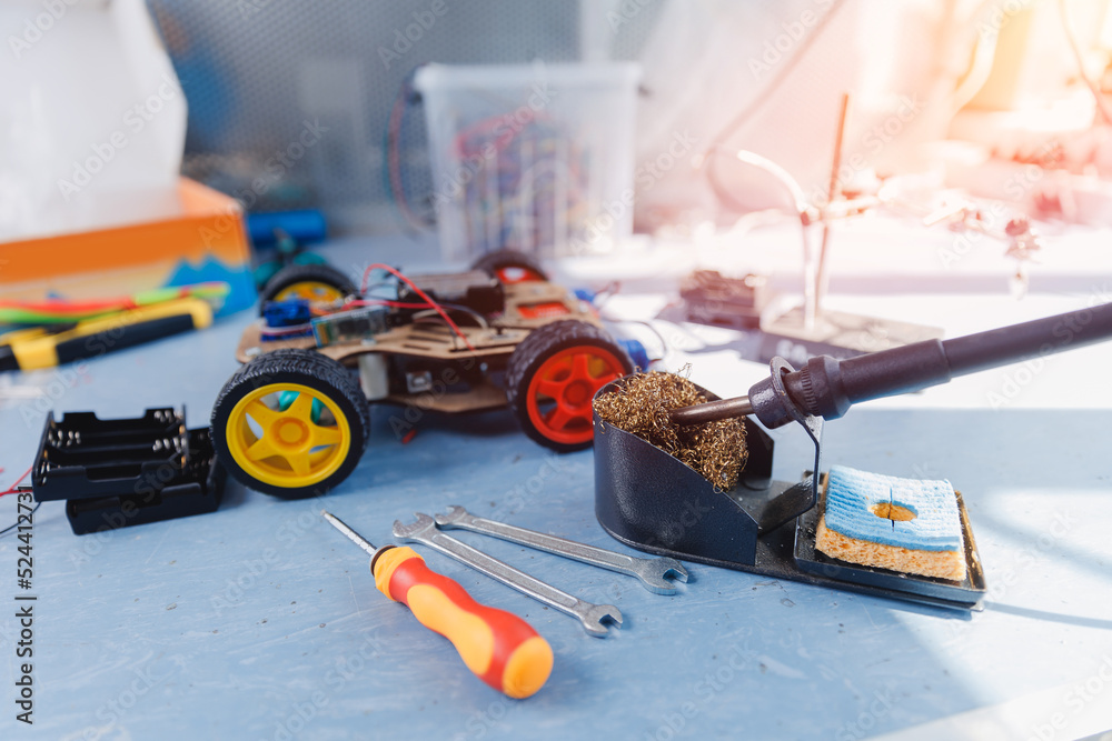 Teaching children engineering design machine toys. Workplace for child ...