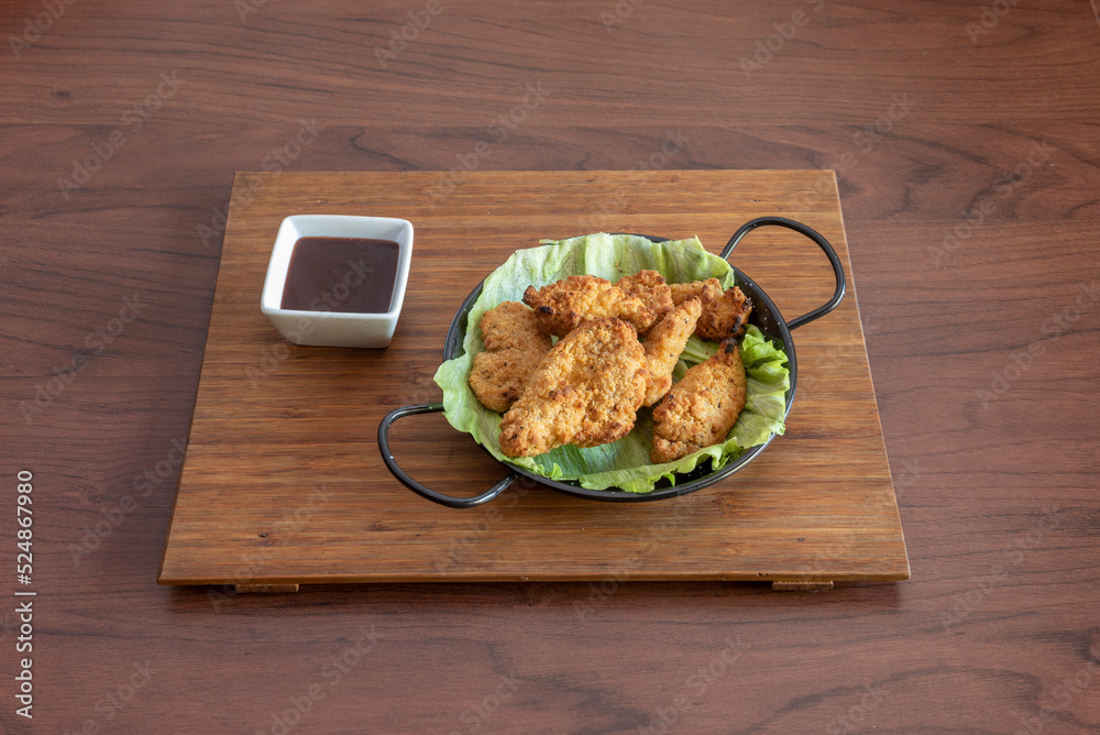 Chicken strips, also known as chicken fingers: one of the most common ...