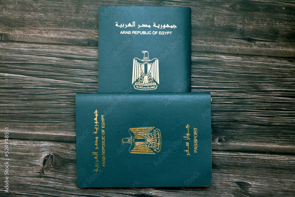Egyptian passport isolated on wooden background, Arab republic of Egypt ...