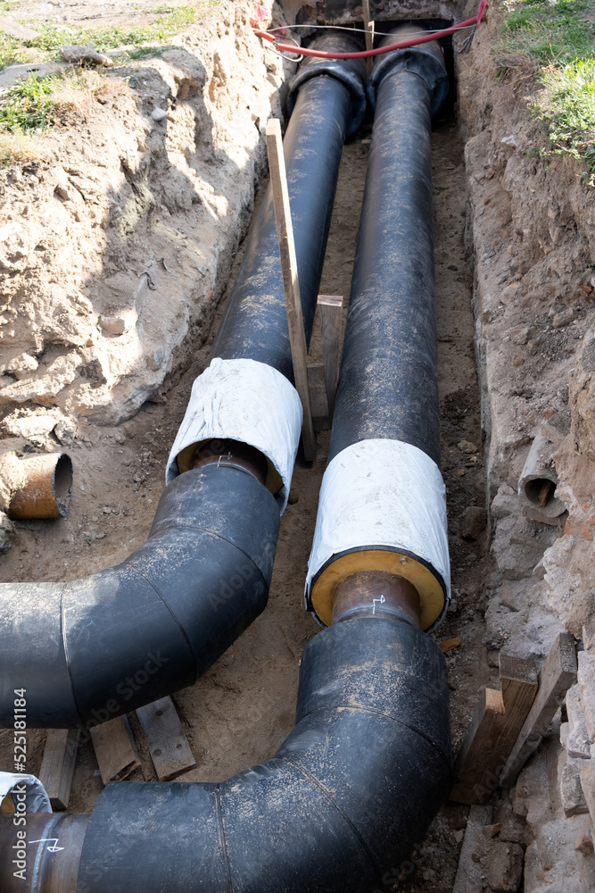 Large water and sewer a new tube pipe at construction site, stacked pvc ...