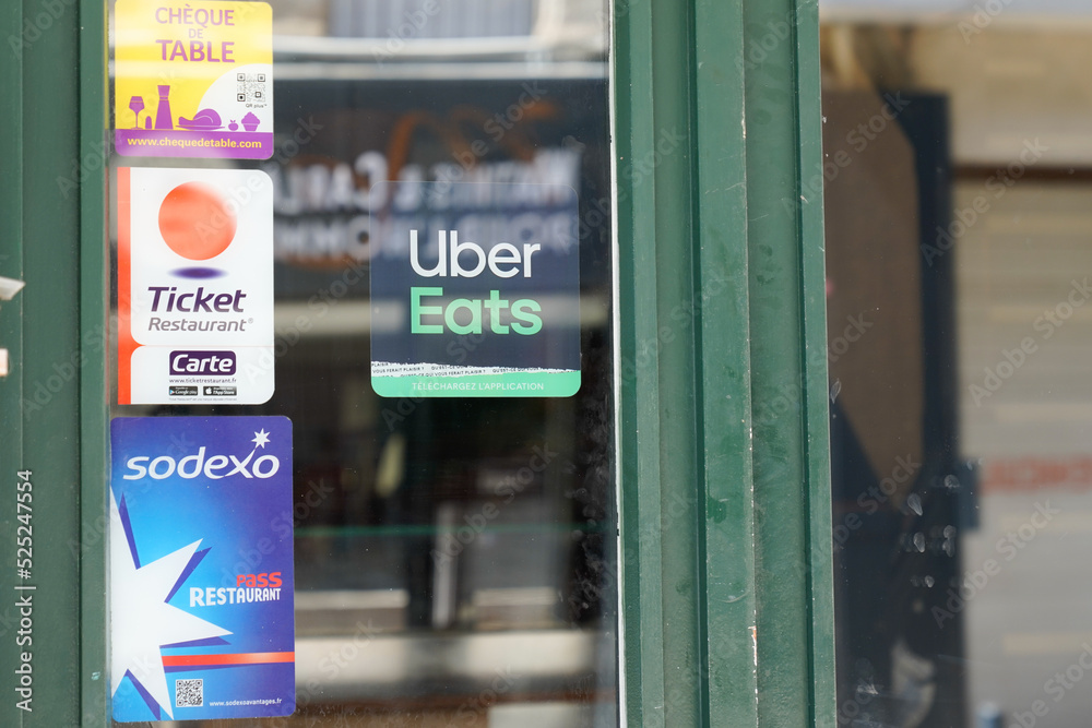 Foto Ticket Restaurant and uber eats brand logo and text cheque de ...