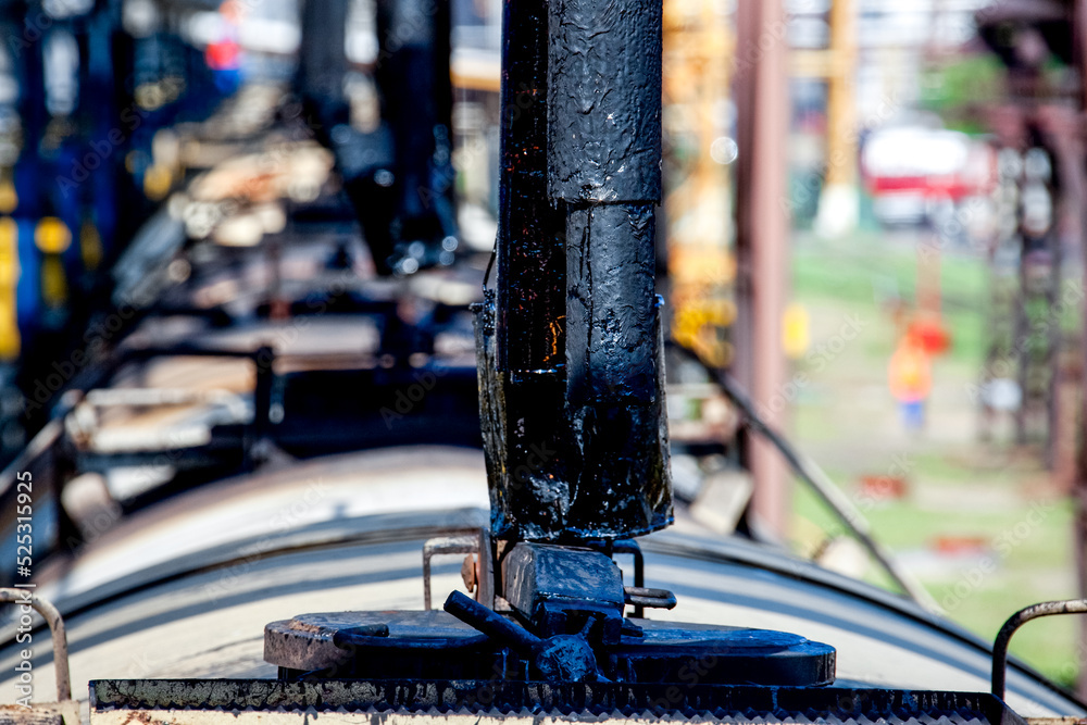 Filling tanks at an oil refinery. Cargo oil transportation in tanks by ...