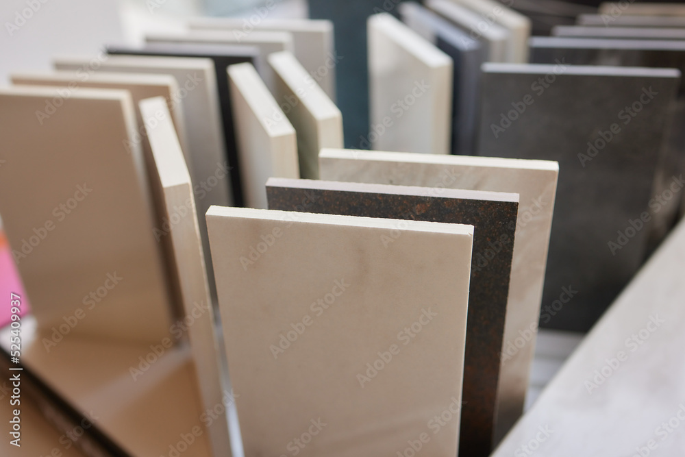 Exposition of ceramics in a showroom new tiling option for floors and ...