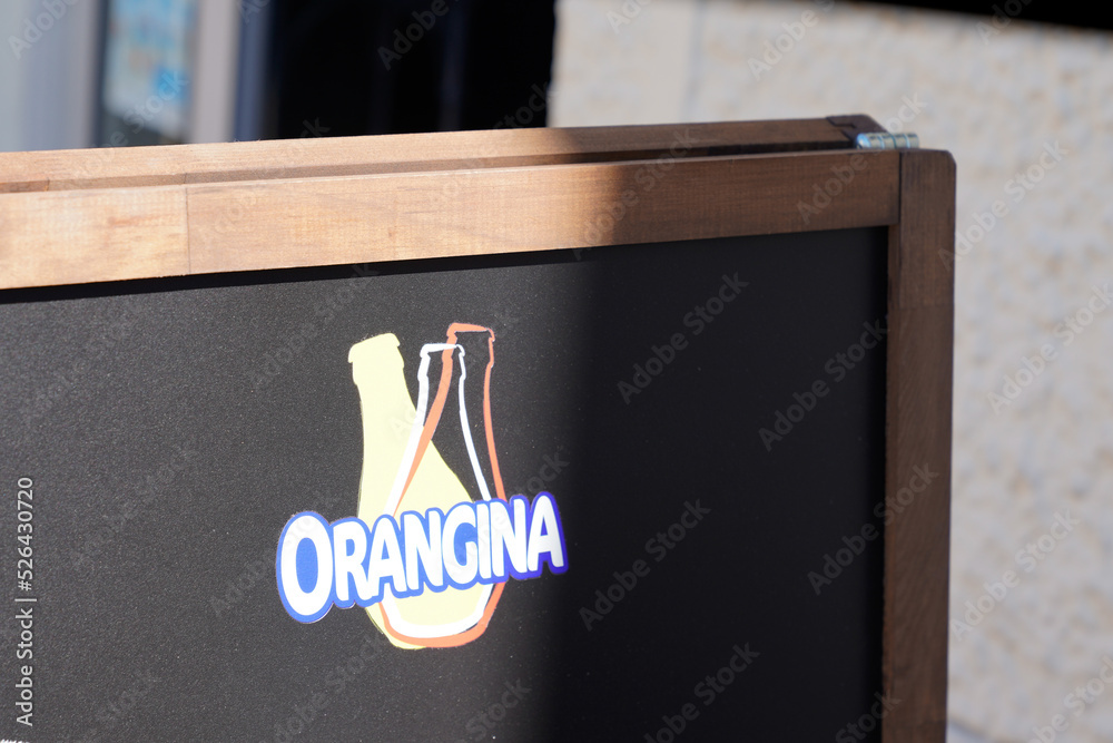 Orangina orange lemonade logo sign and brand text on billboard at the ...